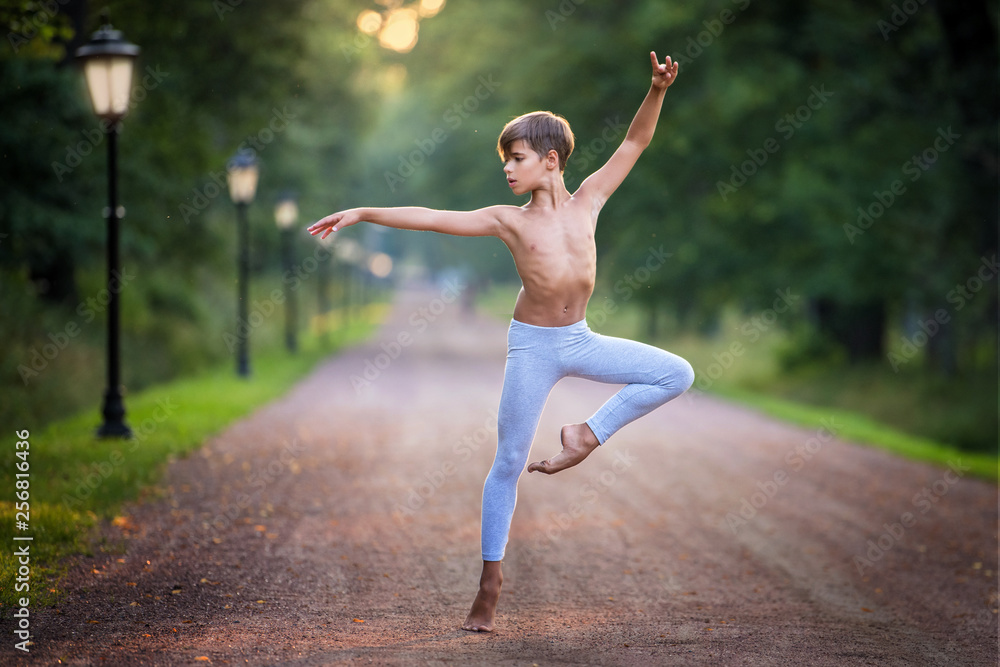 boy dancing in the park Stock Photo | Adobe Stock