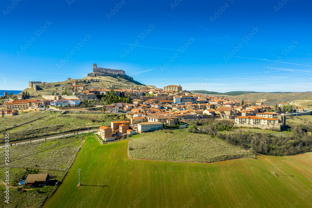 Atienza aerial panorama with blue sky of medieval ruined castle and ...