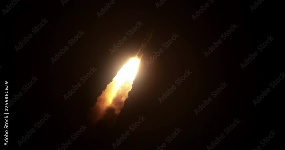 Stockvideo Spectacular nighttime shot of a space Rocket spewing fire ...