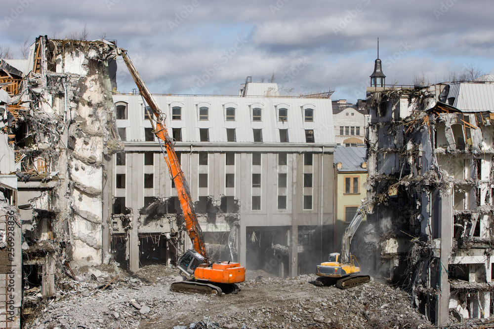 Building of the former hotel demolition for new construction, using a ...