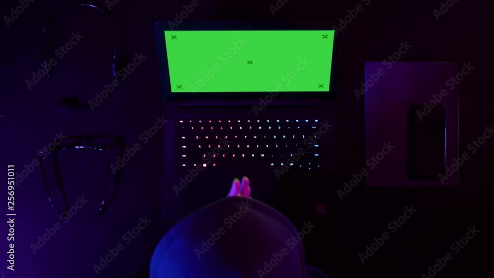 Hacker hacking system on a laptop. Green Screen Mock-up Display. Stock ...
