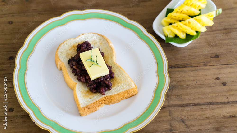 red bean toast with butter and fruits. ang butter bread. breakfast ...