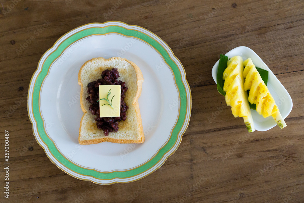red bean toast with butter and fruits. ang butter bread. breakfast ...