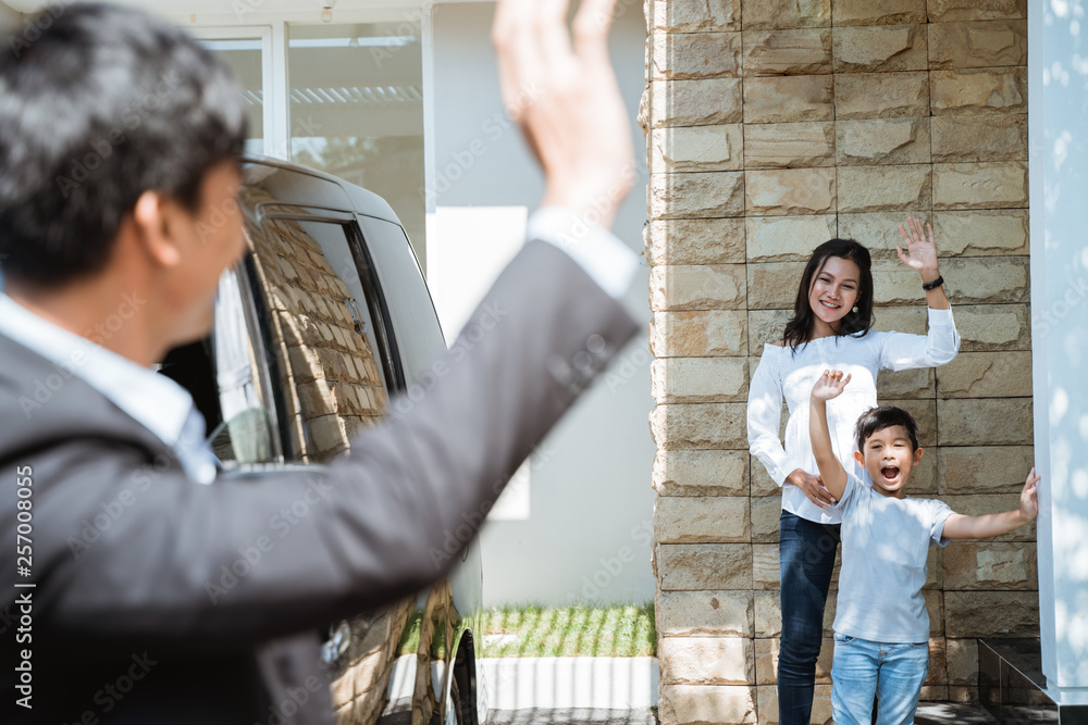 Family Waving Goodbye