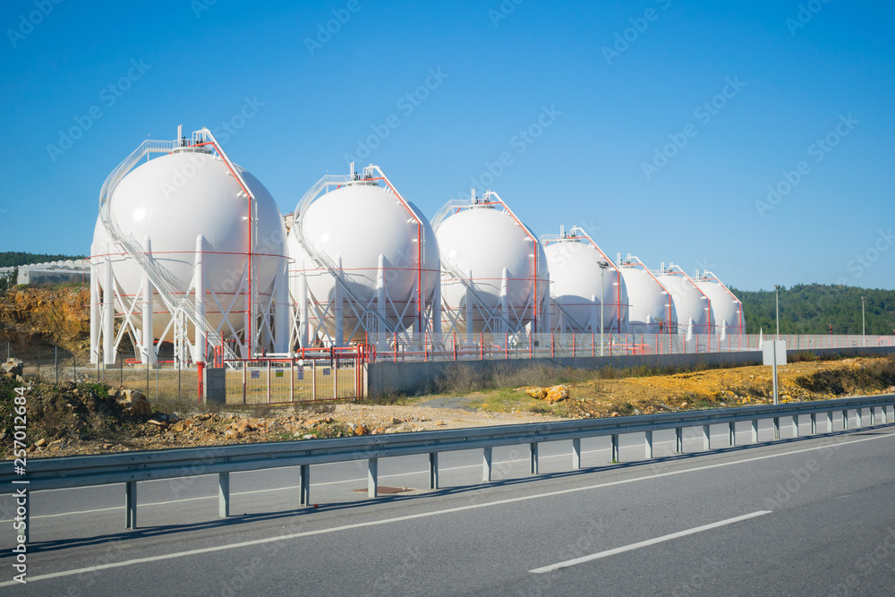 LNG or LPG storage plant, seven liquefied natural gas tanks Stock Photo ...