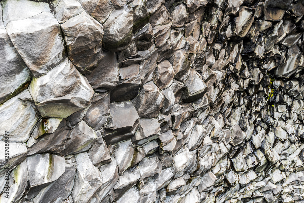 Perspective view of Basalt cliffs pattern inside the cave in the bottom ...