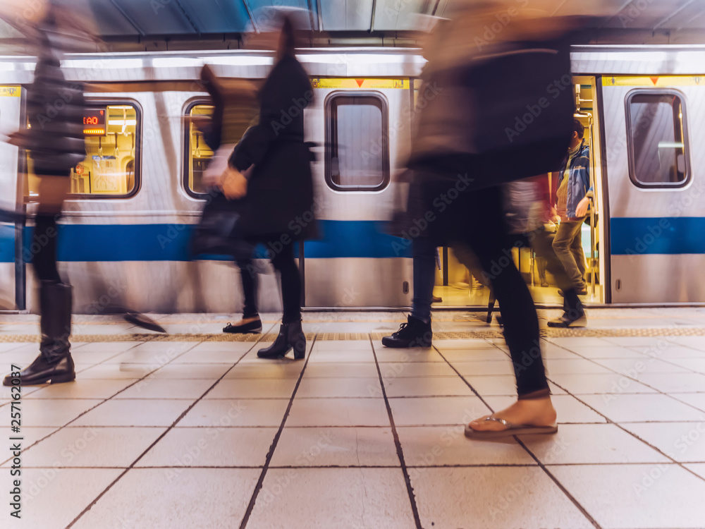 People getting off the subway train. Motion blur. City life. Toned ...