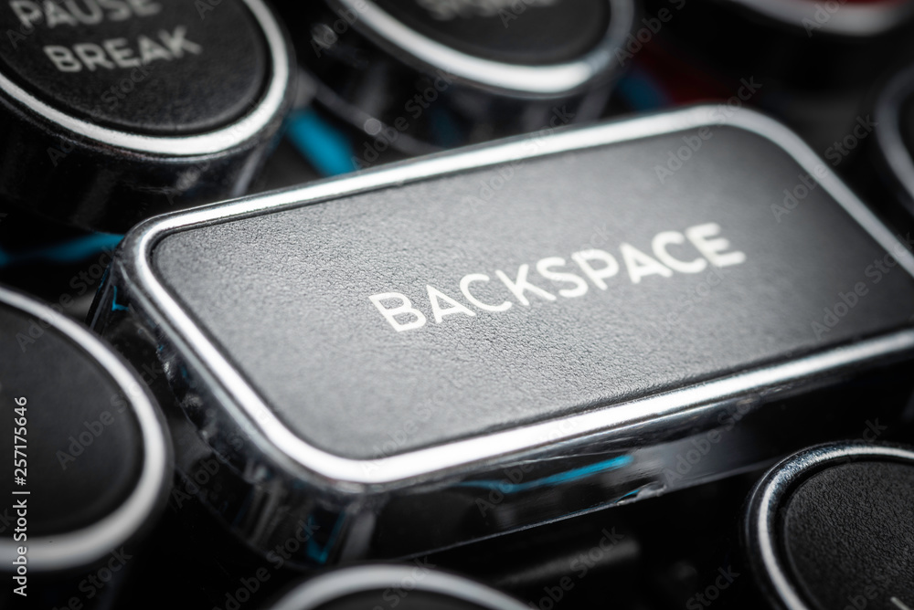 An extreme close-up or macro shot of a rectangular BACKSPACE key on a ...