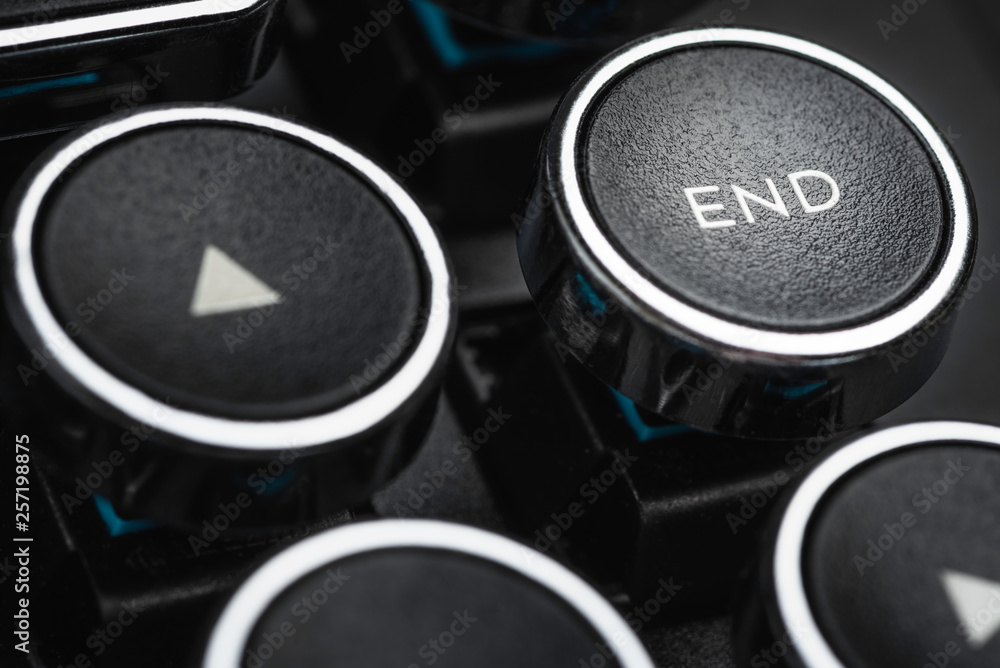 An extreme close-up or macro shot of a round END key on a vintage ...