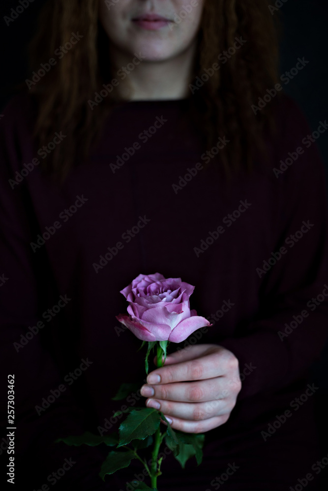 Sad Girl With Flower In Hand