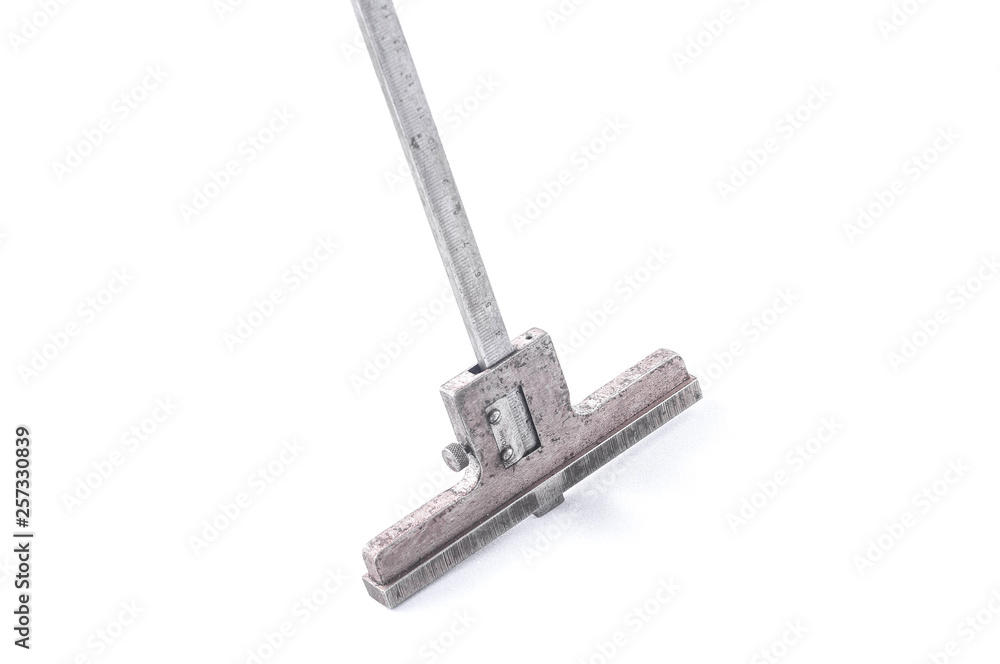 Depth gauge for measuring the height of cavities on a white background ...