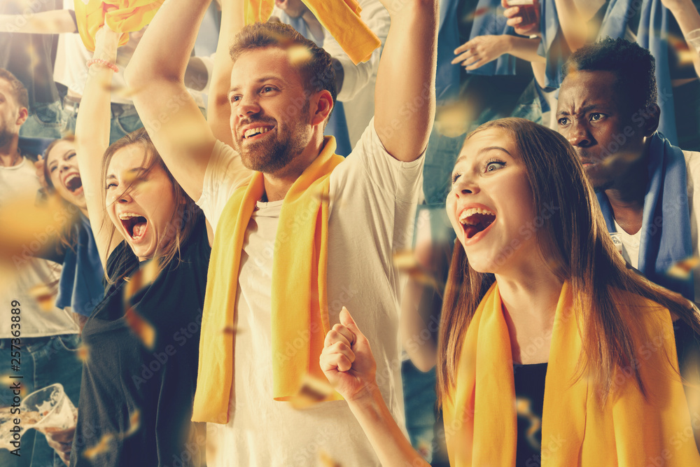Group of happy fans are cheering for their team victory. Collage made ...