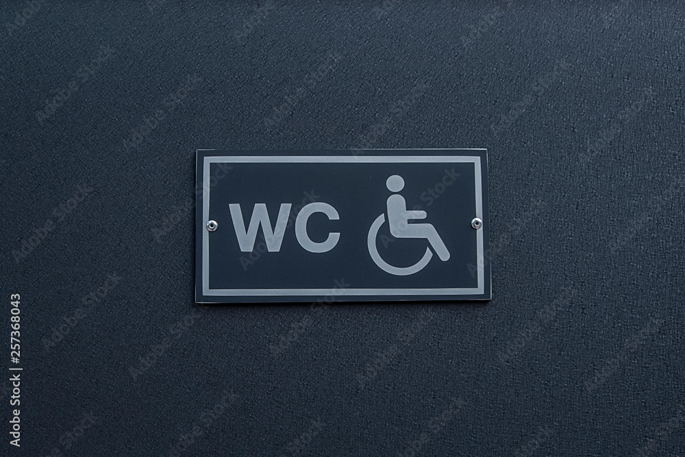 Disable toilet sign at a restroom door,Wheelchair icon, - image Stock ...