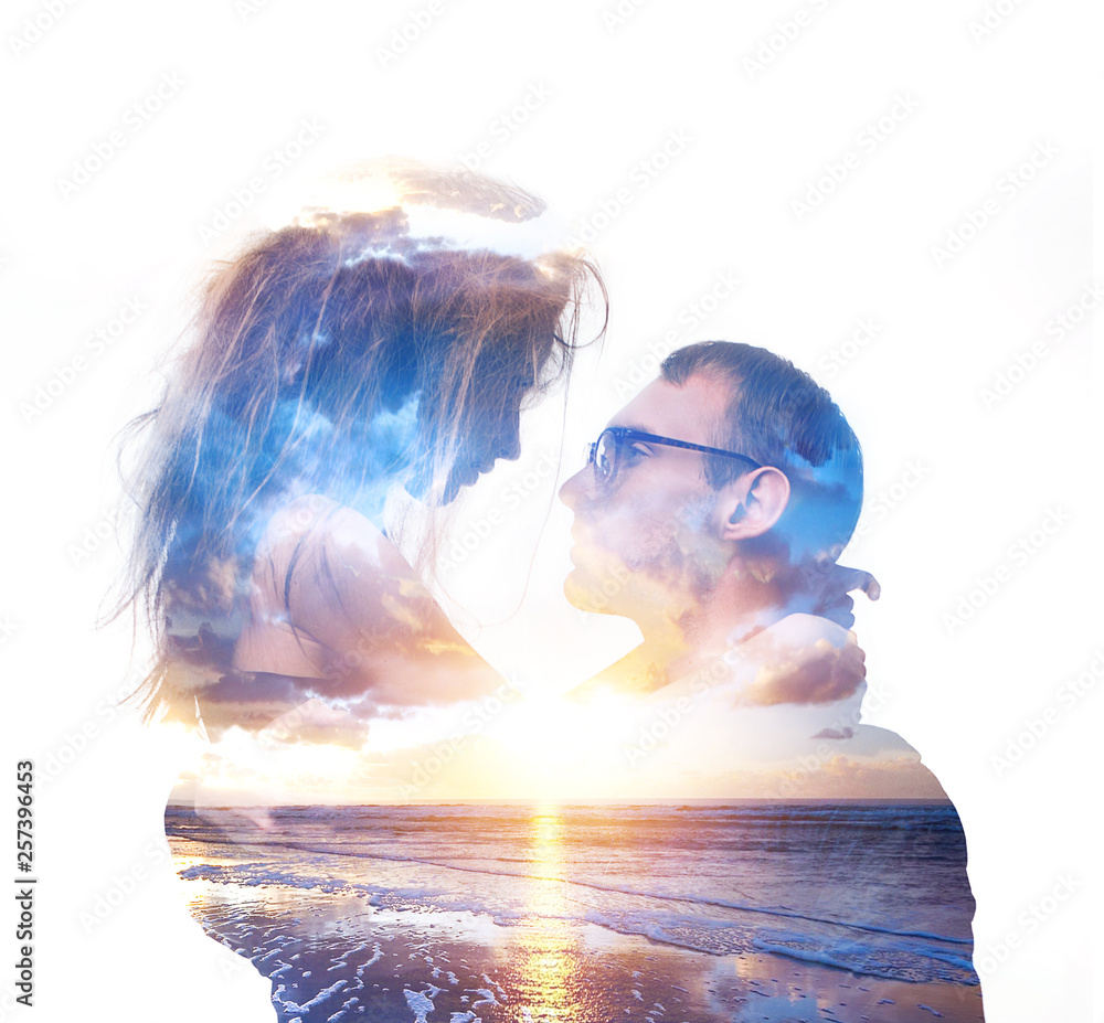 Double exposure portrait of hugging couple with ocean and sunset sky ...