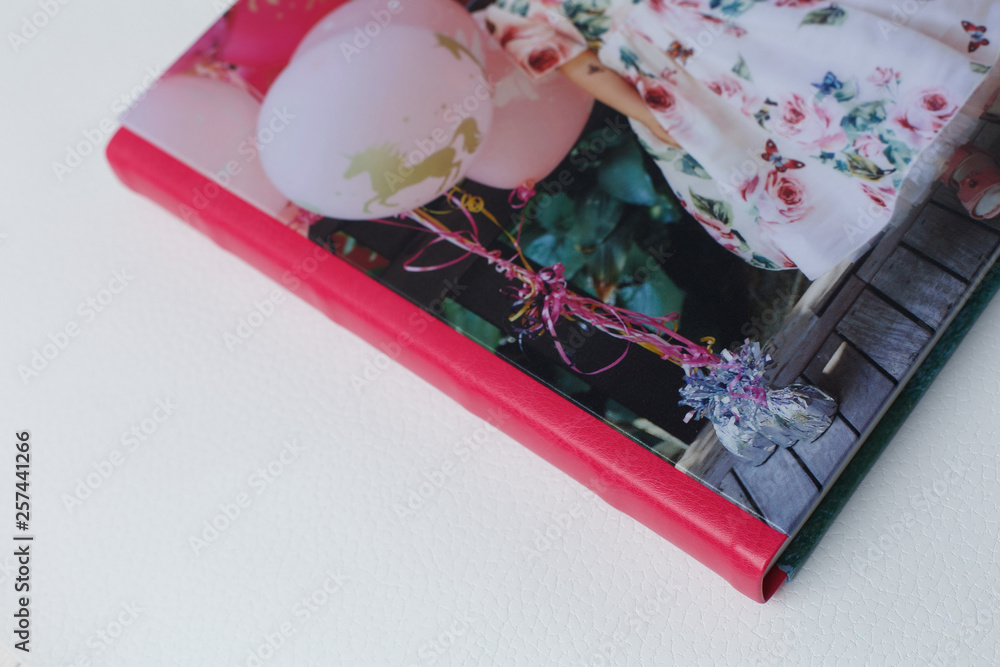 pink photobook on a white background. stylish wedding photo album ...