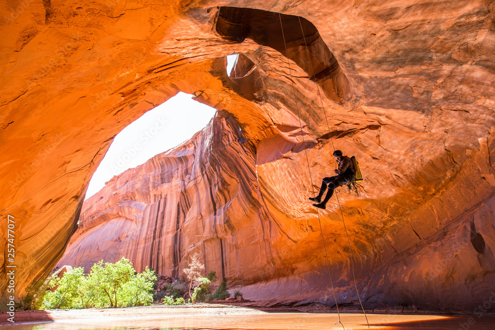Eric Odenthal rappelling into the Golden Cathedral near the end of Neon ...