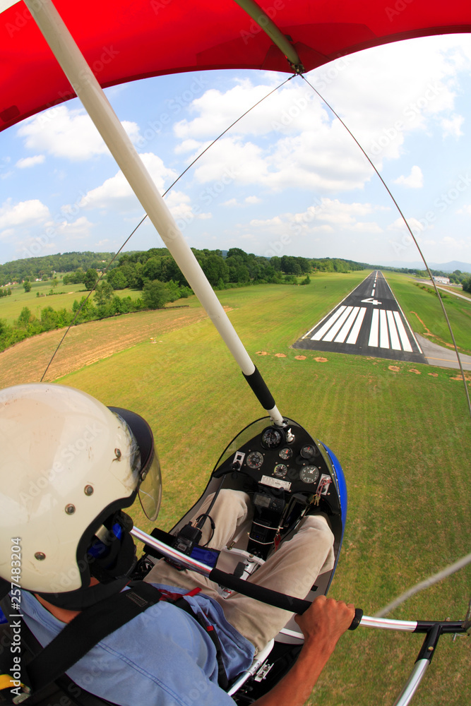 In-cockpit view of a man flying his Airborne Classic ultralight trike ...