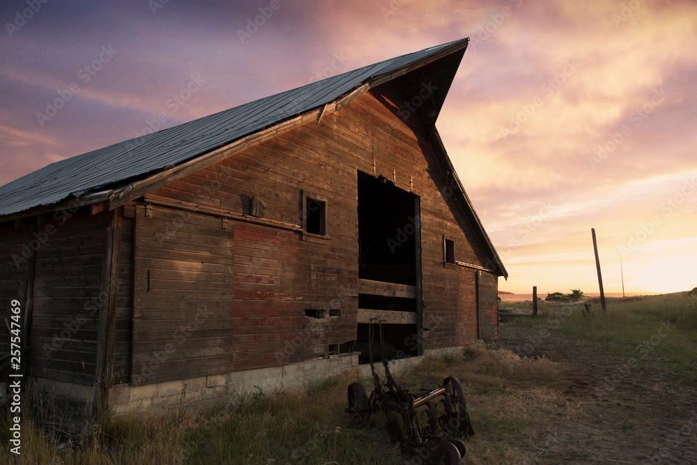 A beautiful old barn at sunset Stock Photo | Adobe Stock