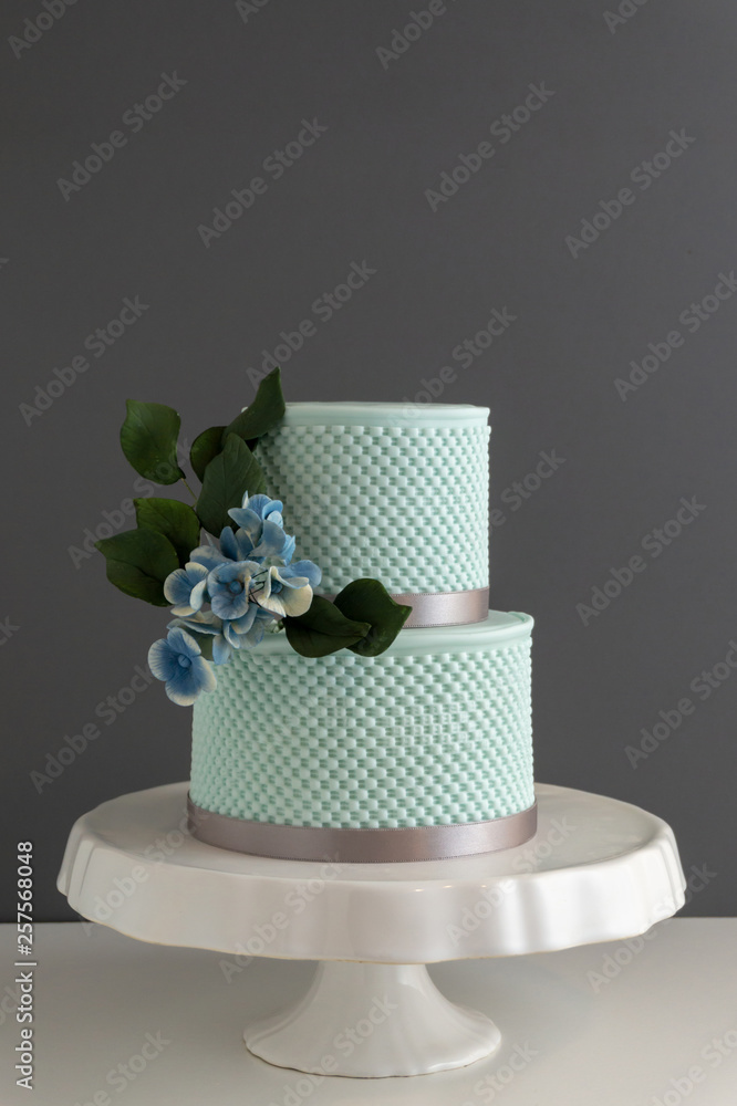 Elegant 2 Tier Wedding Cake With Texture And Edible Sugar Flowers Stock ...