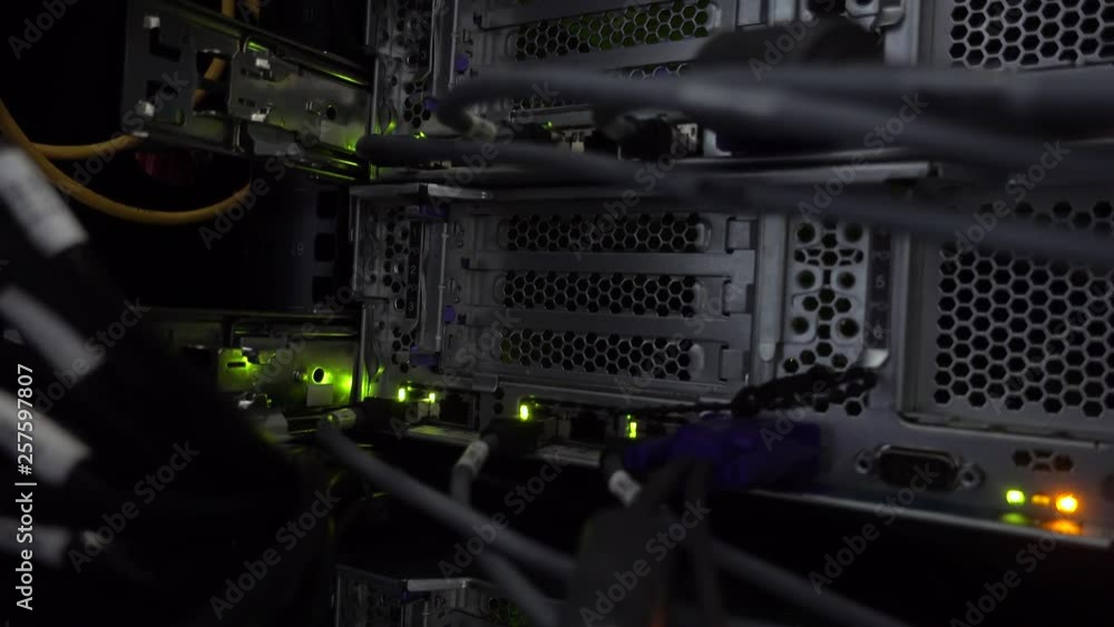 Back panel of powerful servers installed in the rack of the server room ...