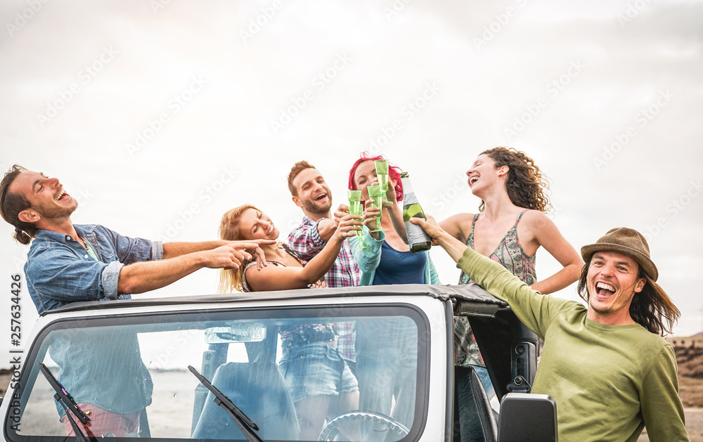 Group of happy friends making party on convertible car - Millennial ...