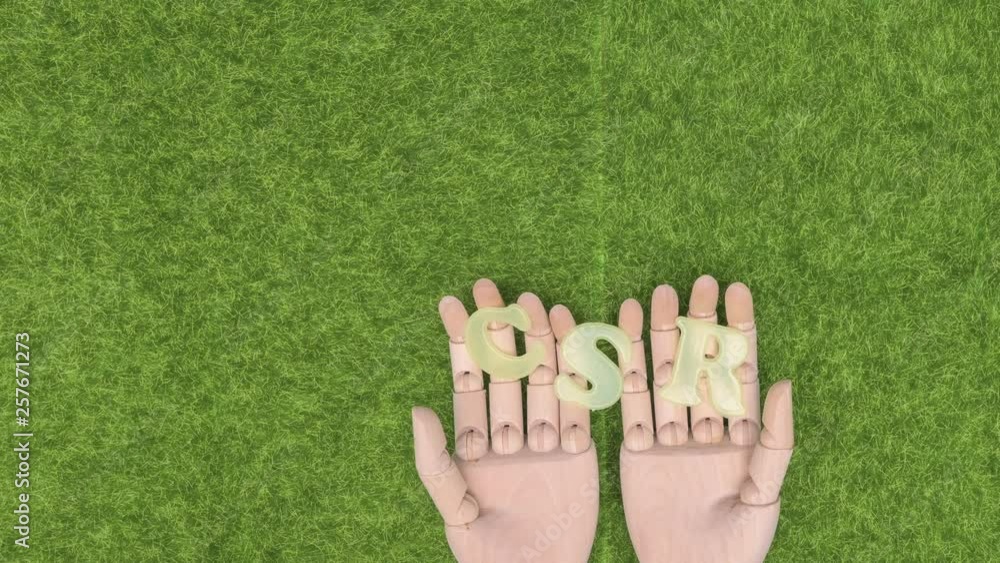 Stop Motion Animation. Green grass wooden hands with CSR, Corporate ...
