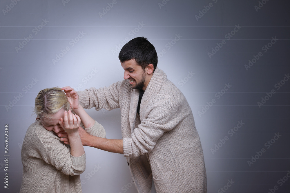 Man brandishing his wife. Husband and wife arguing, man and woman ...