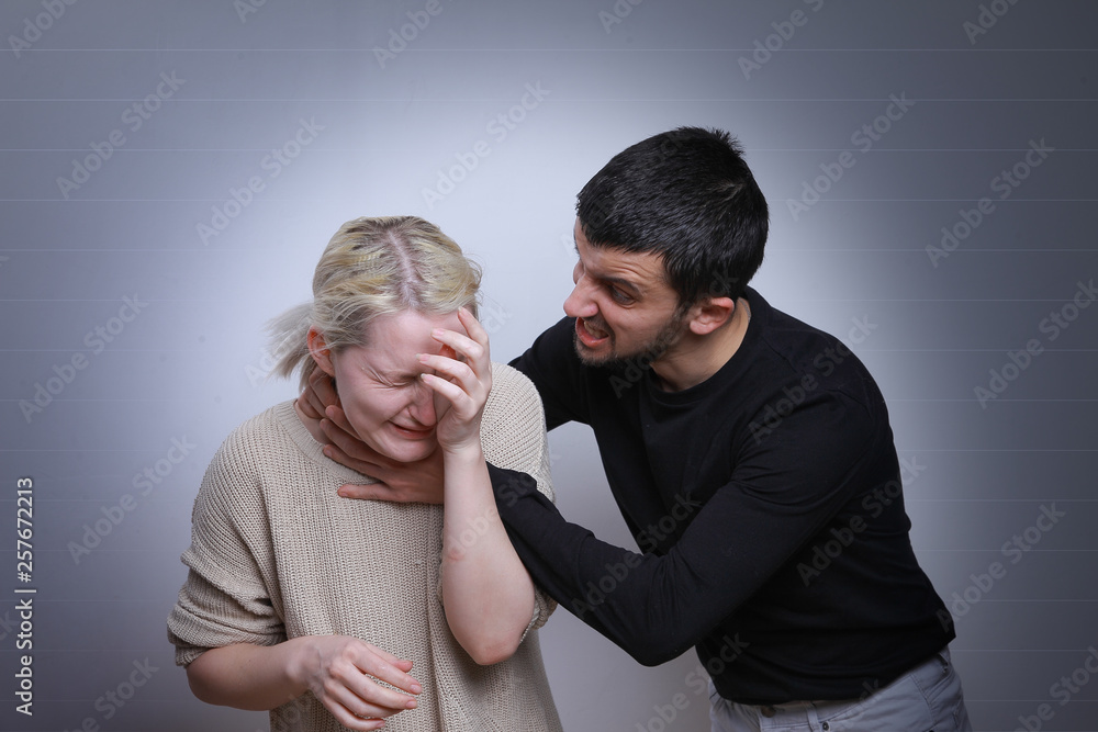 Man brandishing his wife. Husband and wife arguing, man and woman ...