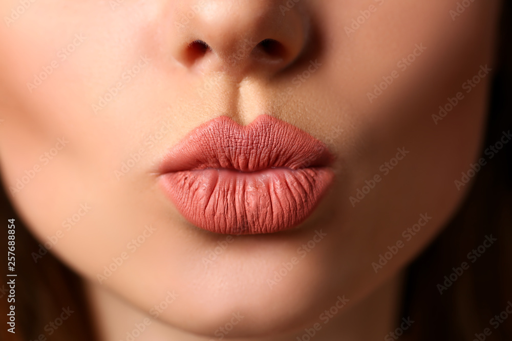 Beautiful female lips making kiss gesture flirting to camera Stock ...
