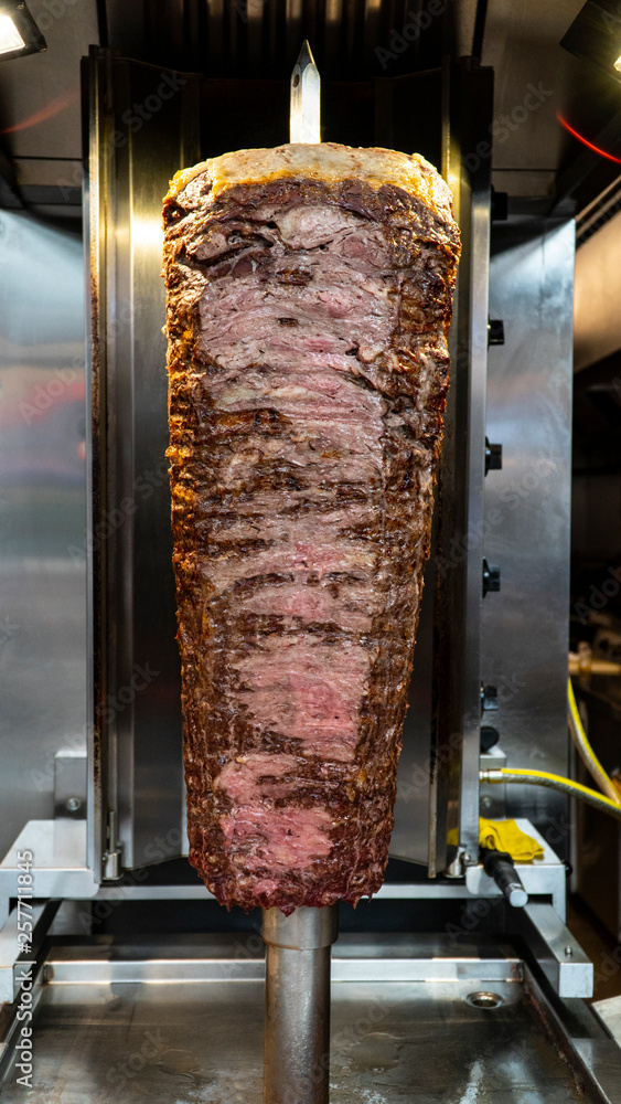 doner knife Traditional Turkish Doner Kebab meat. shawarma or gyros ...