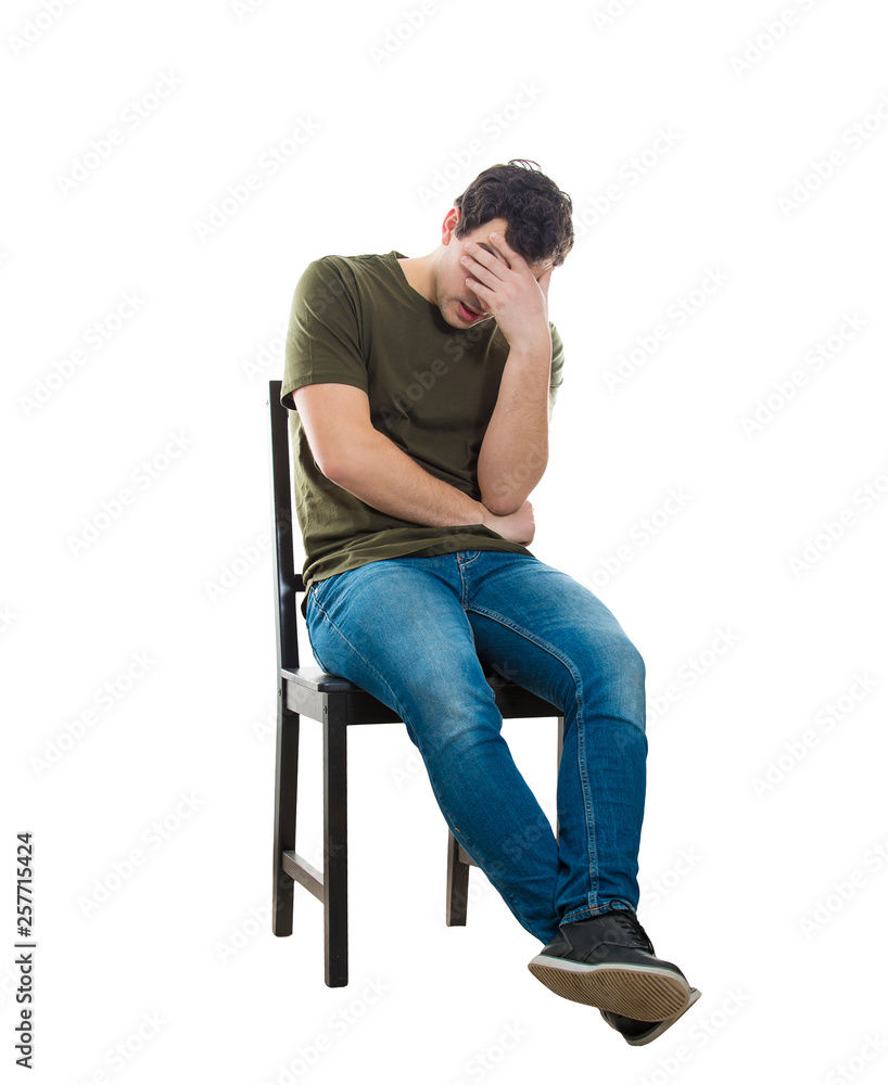 disappointed man sitting on a chair Stock Photo | Adobe Stock