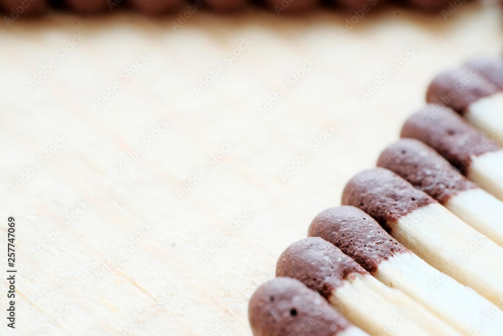 Ordinary matches are on the diagonal on a light background. A mountain ...