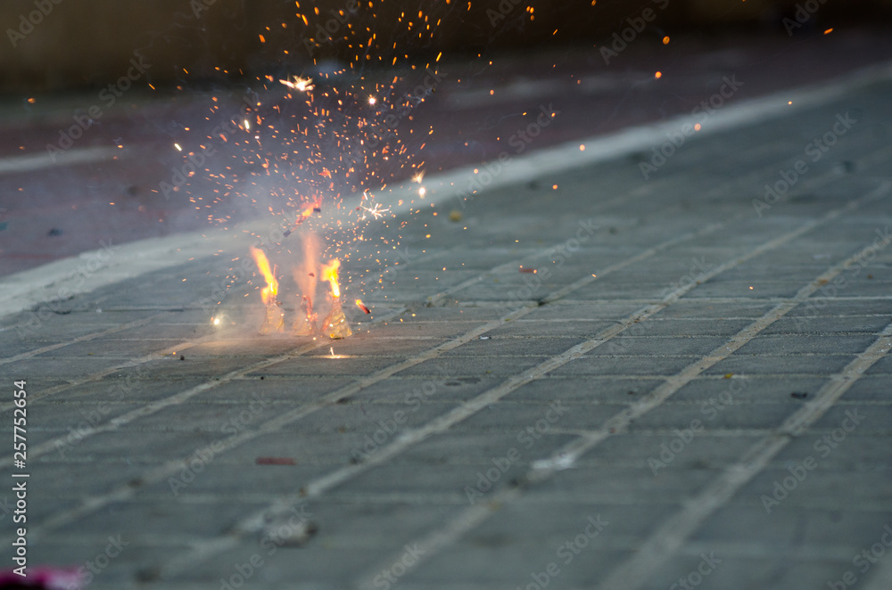 Firecrackers exploding in the street for the Fallas celebration in ...