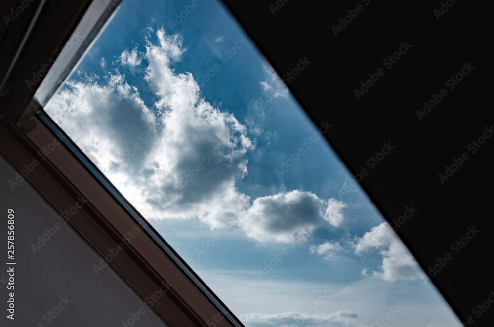 Attic. View from the window. View of the sky from the window. Skylight ...