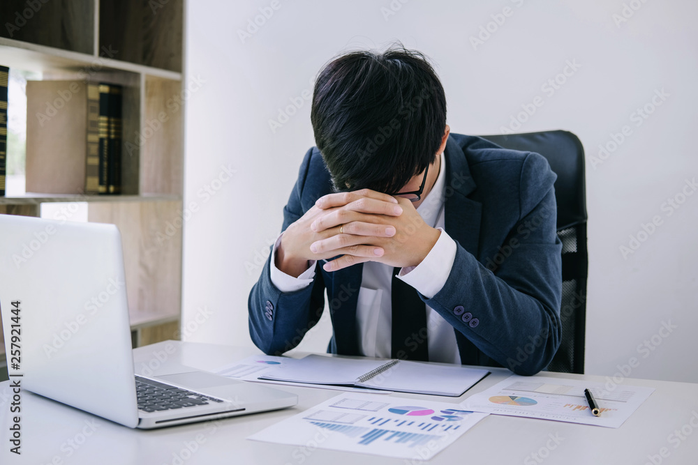 Businessman depressed and exhausted, businessman at his desk frustrated ...