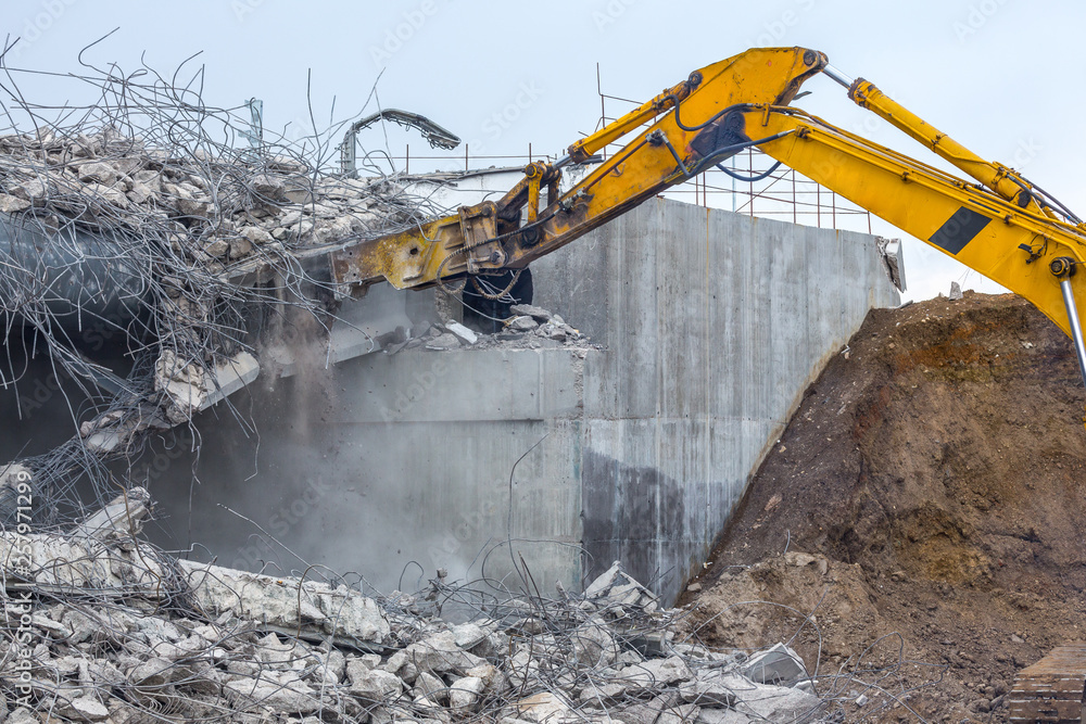 Professional demolition of reinforced concrete structures using ...