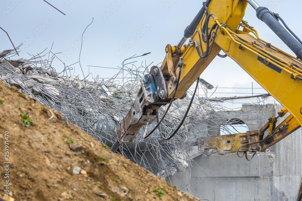 Professional demolition of reinforced concrete structures using ...
