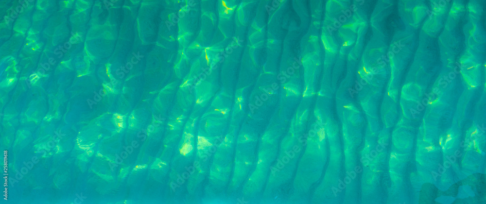 Green abstract texture background of emerald green sea water. Top view ...