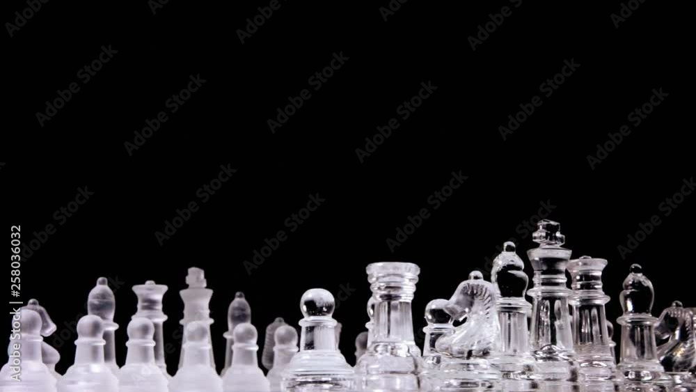 A magnificent chessboard with two different full sets of chess pieces ...