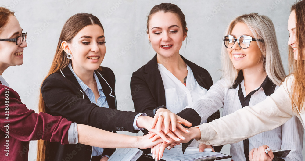 Cooperation unity and support. Female power. Successful business ladies ...