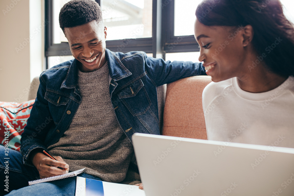 Students completing their class assignment Stock Photo | Adobe Stock