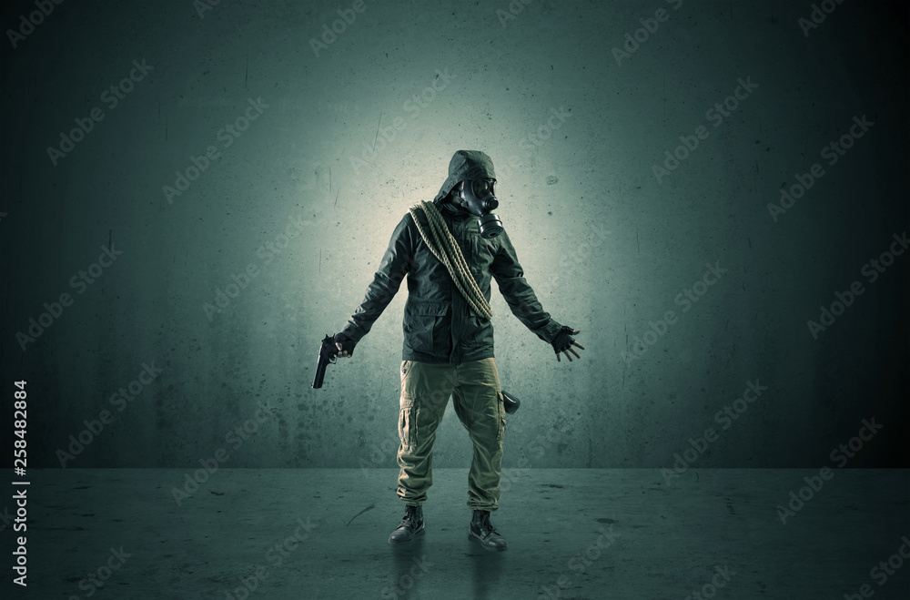 Bad agent in a dark room with arms on his hand and gas mask Stock Photo ...