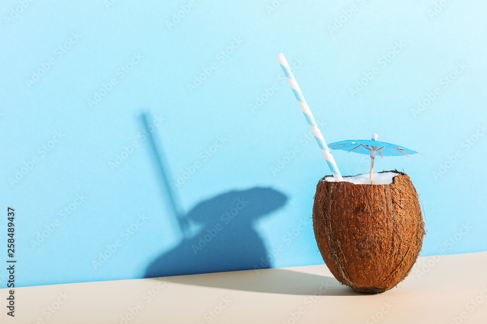 Tropical Drink In Coconut With Umbrella