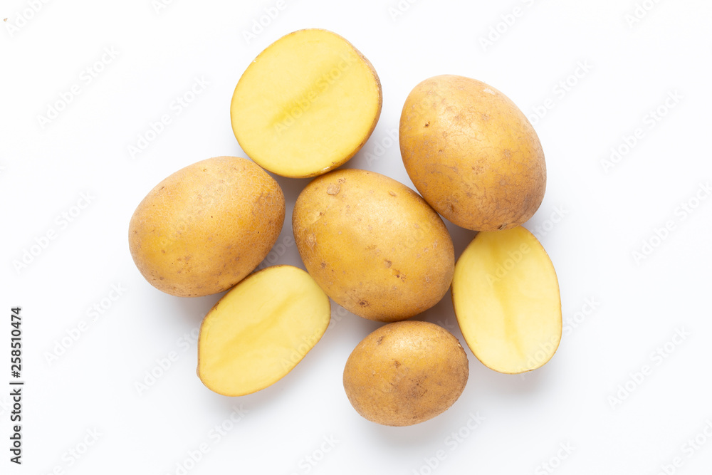 Potatoes isolated on white background. Flat lay. Top view. Stock Photo ...