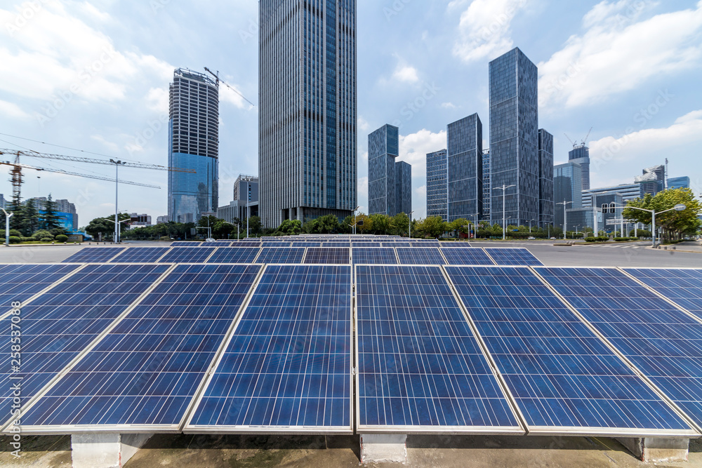 Solar and modern city skyline Stock Photo | Adobe Stock