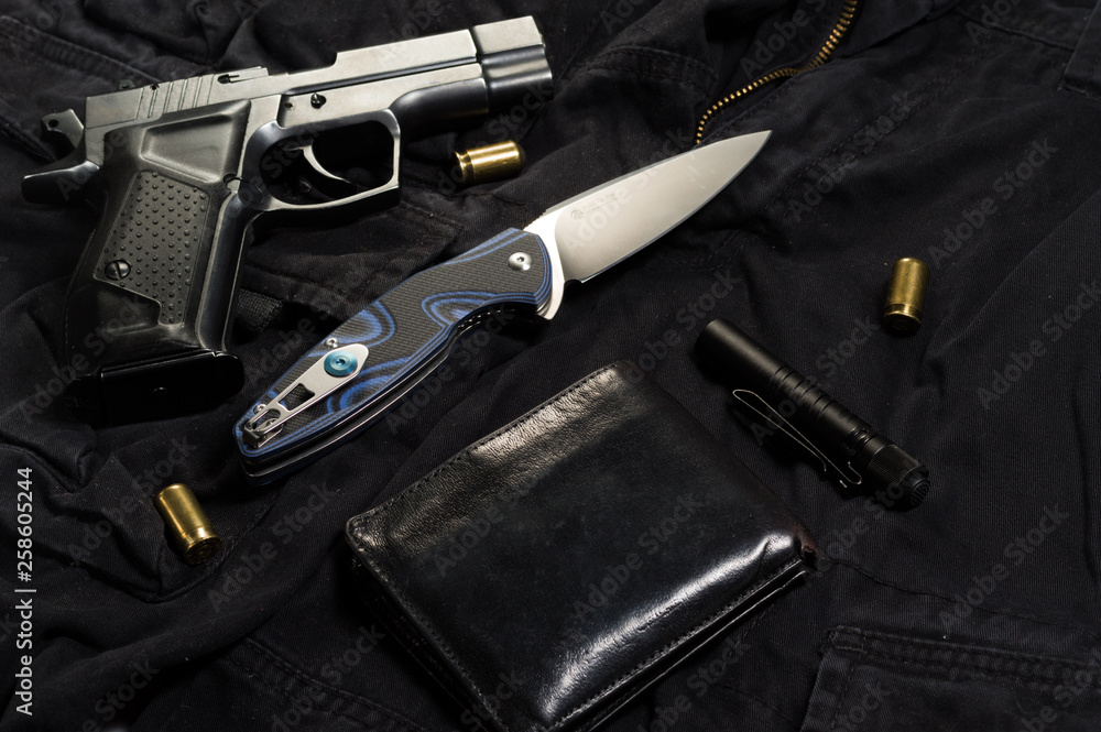 Traumatic pistol and cartridges. Weapons for self-defense. Stock Photo ...
