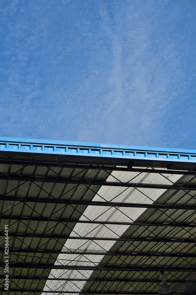An exterior of a sport hall showing metal sheet and steel construction ...