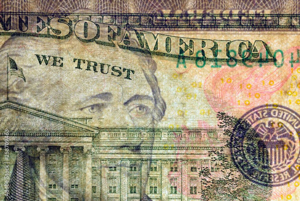 10 bucks. Close-up at We Trust text & president Hamilton eyes, highly ...