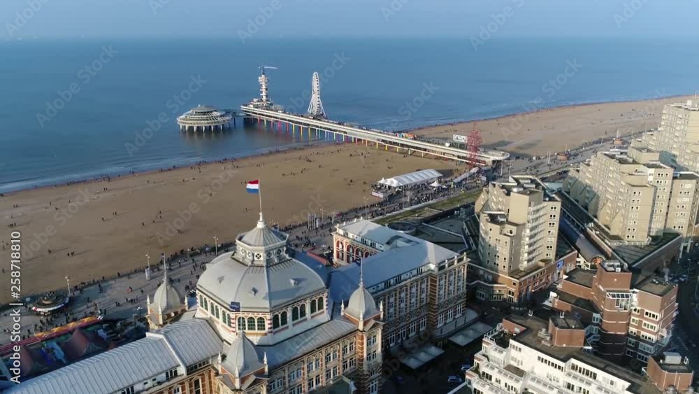 Aerial bird view footage of Dutch coastline located at Scheveningen is ...