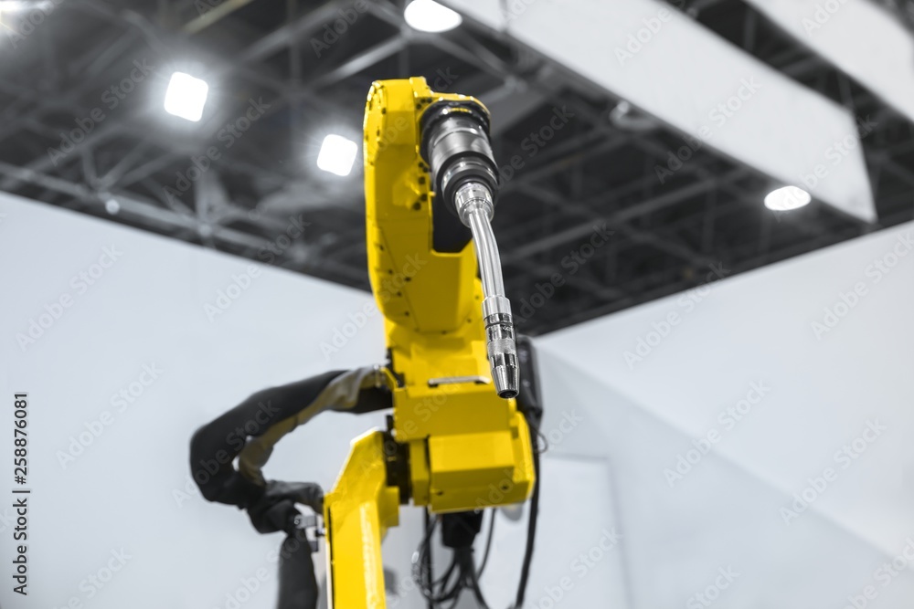 Automatic robot arm working in industrial environment Stock Photo ...